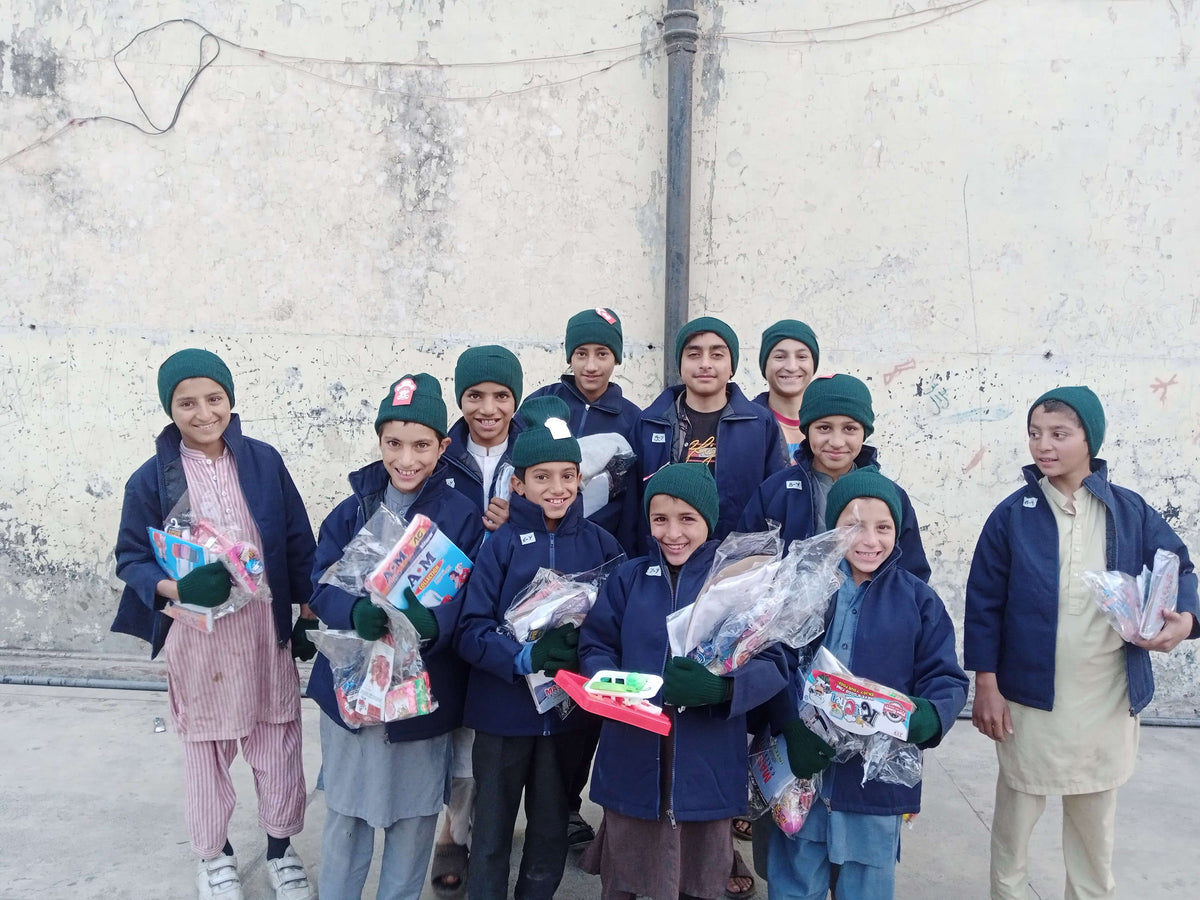 Lahore, Pakistan - Participating in Orphan Support Program by Distribu ...