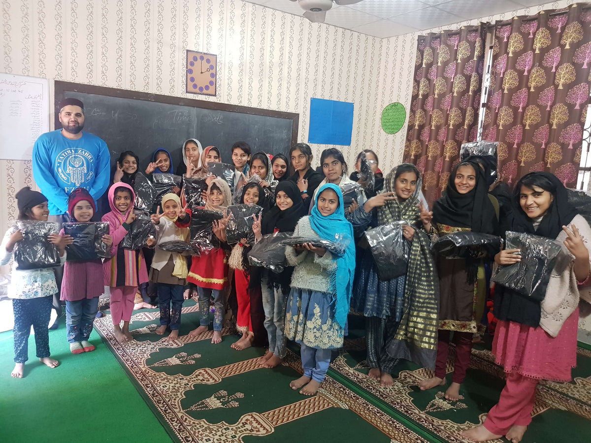 Lahore, Pakistan - Participating in Orphan Support Program by Distribu ...